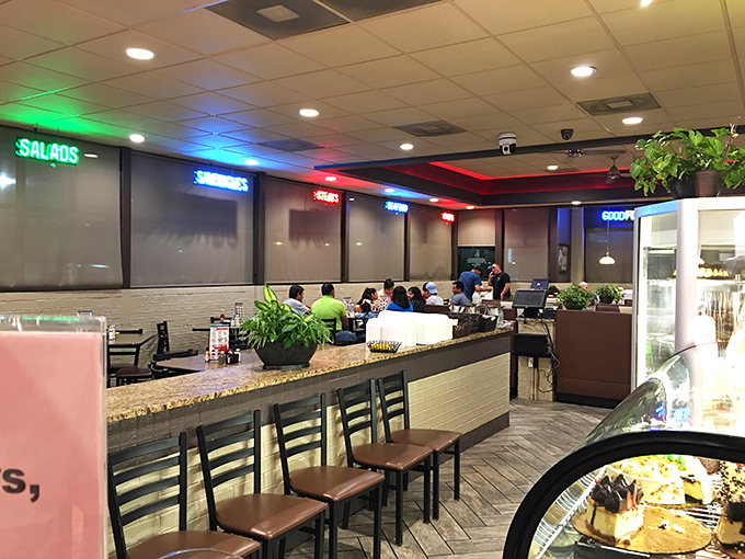 The counter area offers a front-row seat to the choreographed chaos of a busy diner, where efficiency meets hospitality.