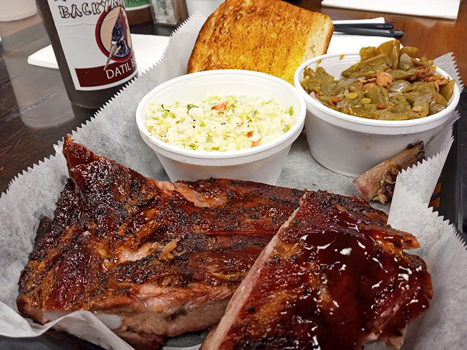 Ribs with a bark so perfect they deserve their own exhibition at an art gallery. The coleslaw provides the necessary coolness to an otherwise heated affair.