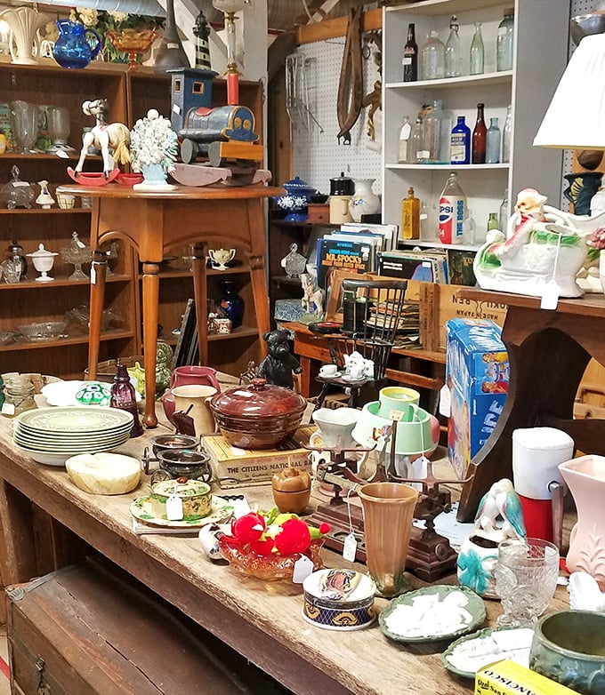 A tabletop symphony of mismatched treasures that somehow belong together, like the perfect potluck where everyone brings their signature dish.