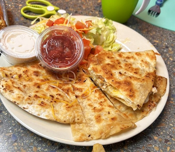 A quesadilla that proves Dad's Garage isn't just about burgers&mdash;it's about making everything delicious, one melted cheese creation at a time.