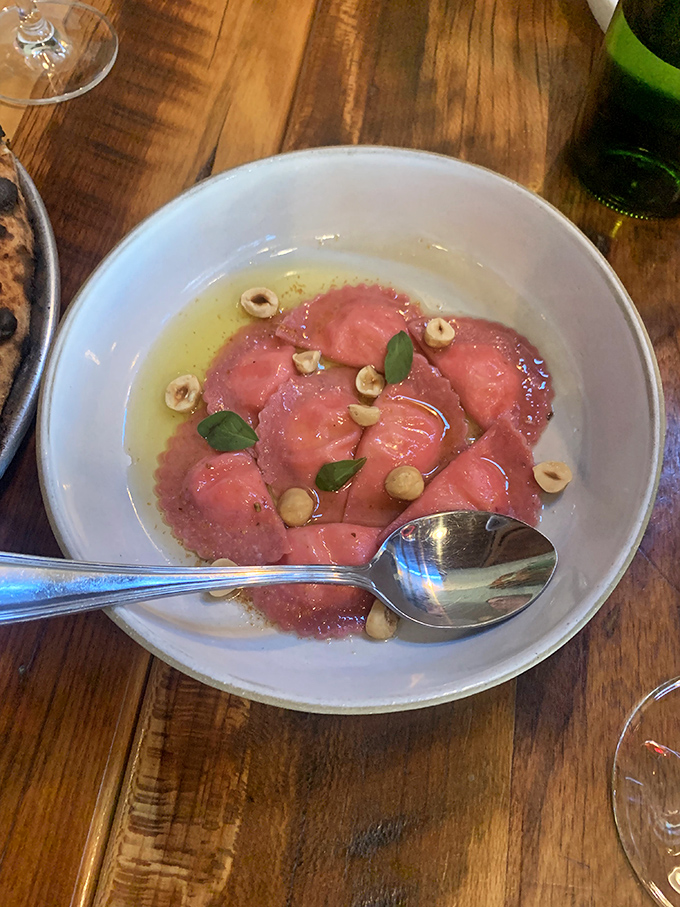 This isn't just pasta&mdash;it's edible art. The delicate ravioli bathing in broth with fresh herbs is the kind of simple perfection that's actually anything but simple.