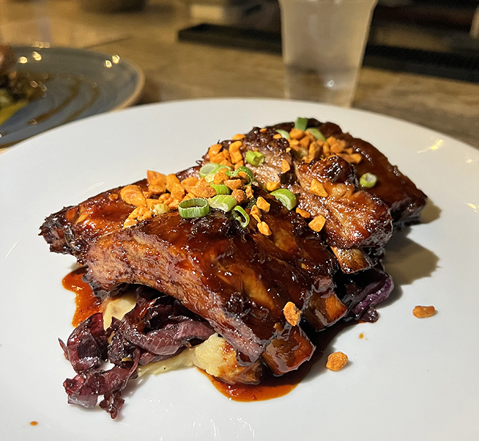 These glazed ribs, tender enough to eat with a spoon, prove the kitchen crew knows their way around land fare as well as seafood. Fall-apart perfection.