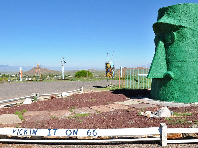 "Kickin' It On 66" says the fence, and who could argue? This green guardian has been keeping it cool in the desert heat for years.