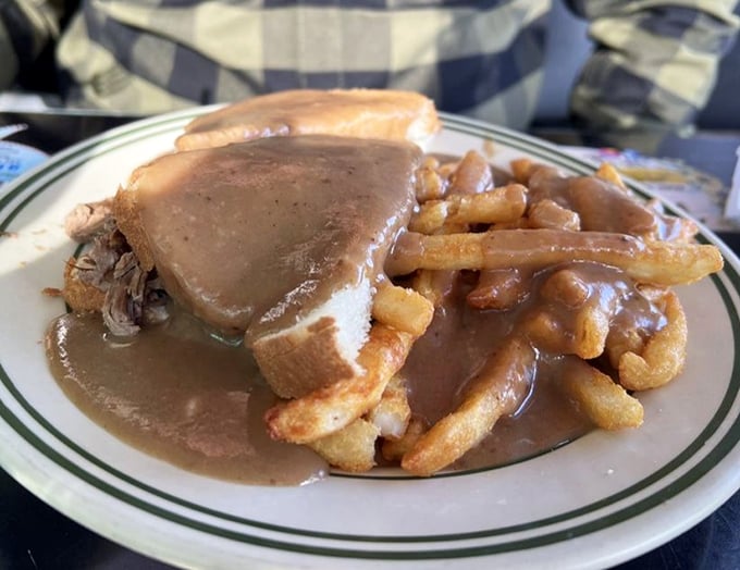 Hot roast beef sandwich swimming in gravy&mdash;comfort food so perfect it should come with a warning: "May induce involuntary food coma and feelings of contentment."
