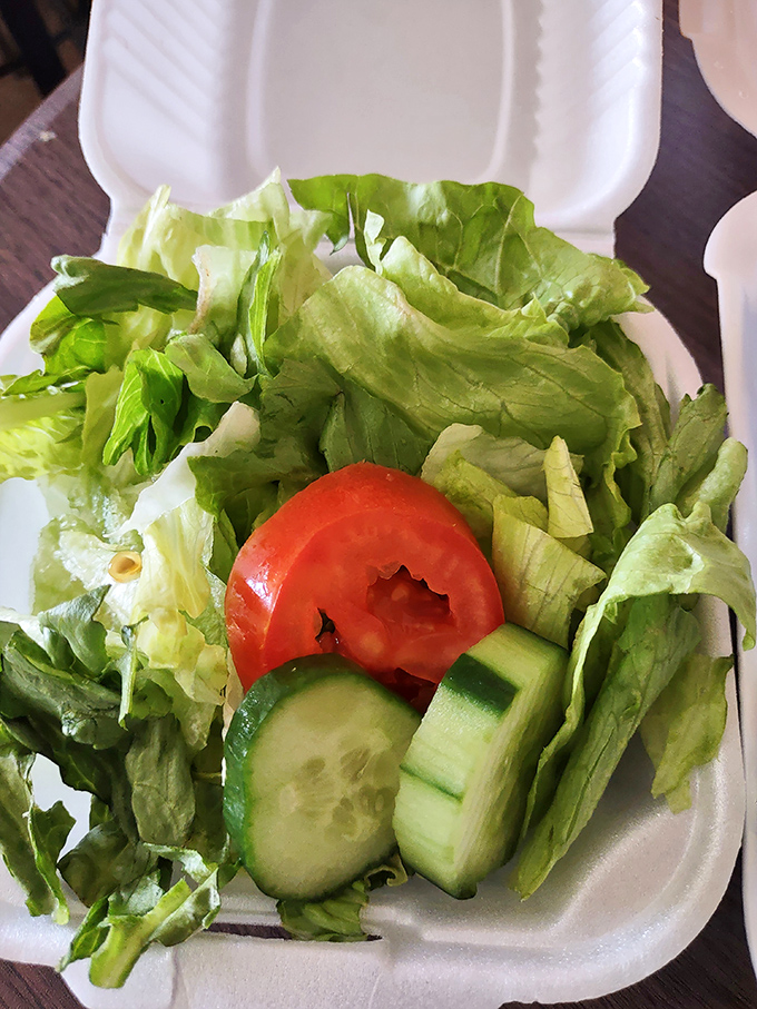Even the side salad shows up dressed for success&mdash;crisp, fresh, and ready to provide the illusion of healthful balance.