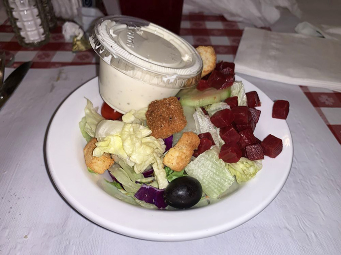 This isn't just a salad &ndash; it's a supporting actor that knows its role perfectly, providing crisp contrast to the hearty main attractions without stealing the spotlight.