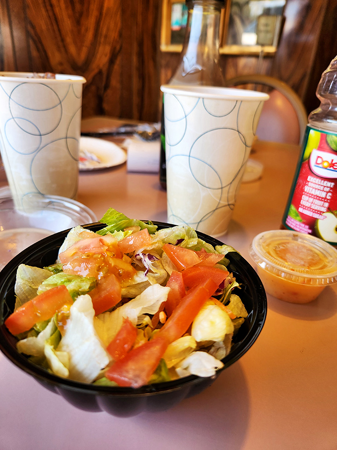 This salad isn't trying to win awards or impress food critics&mdash;it's just doing its honest job of providing something green before the main event arrives. 
