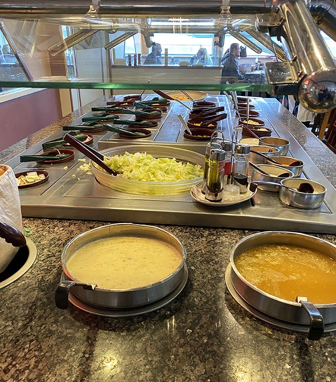 The salad bar and soup station stand ready for action, a buffet of possibilities where you can customize to your heart's content.