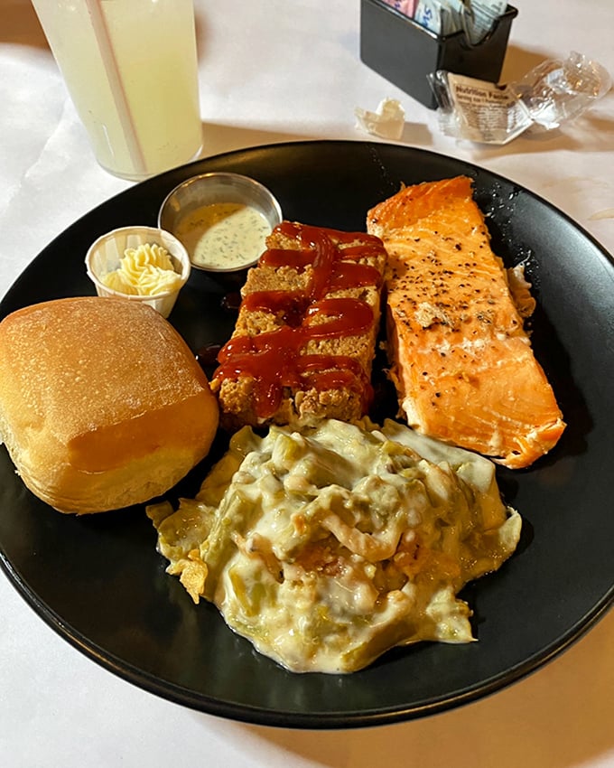 Salmon, chicken, and potatoes sharing a plate like old friends at a reunion &ndash; comfort food that doesn't need fancy plating to impress.