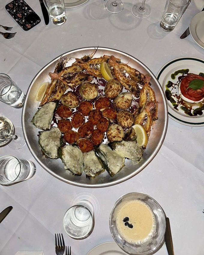 A seafood sampler that turns your table into the Mediterranean's greatest hits album. The caprese salad on the side isn't jealous&mdash;it knows its worth.