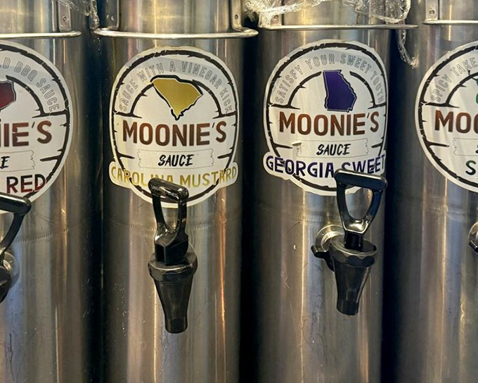 Sauce dispensers lined up like flavor soldiers ready for duty. Carolina Mustard and Georgia Sweet standing by for your dipping pleasure.