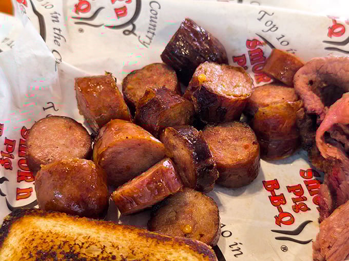 Sausage slices glistening with smoky goodness&mdash;each bite delivering that perfect snap followed by juicy, spiced perfection. Meat candy for grown-ups.