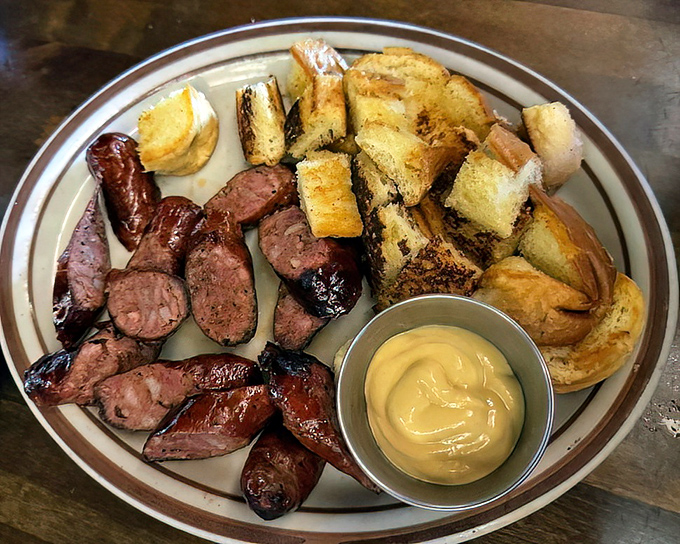 Linguica sausage&mdash;the Portuguese contribution to California cuisine that deserves more recognition. Sliced and grilled to snap-worthy perfection alongside buttery toast points.