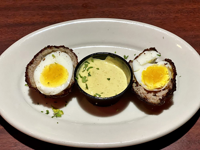 Scotch eggs: where breakfast meets engineering. Perfectly soft yolks encased in savory armor&mdash;Scotland's gift to hungry Americans everywhere. 