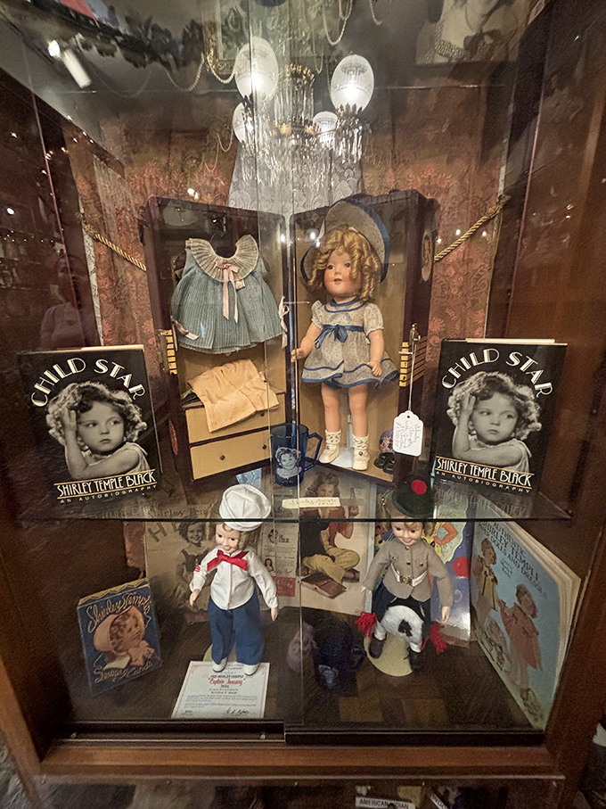 Shirley Temple's legacy lives on behind glass&mdash;her dimpled smile and iconic curls preserved for generations who grew up watching her films.