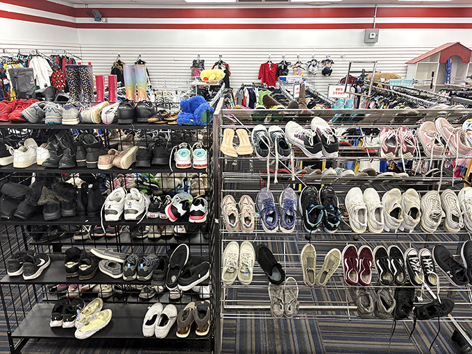 Shoe racks lined with everything from barely-worn sneakers to dress shoes. Someone's "these hurt too much" becomes your "perfect fit" for $8.