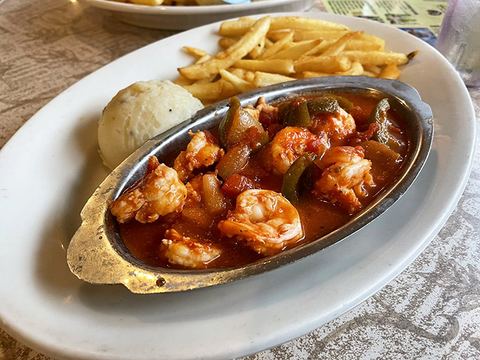 Shrimp Enchilado brings the ocean and garden together in a hot tub of tomato sauce that demands bread for dipping.