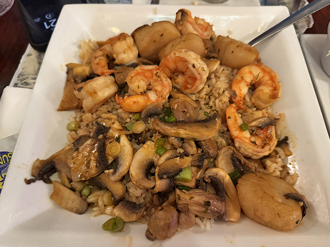 Shrimp and mushrooms over rice &ndash; a plate that whispers, "You made the right choice coming here today."
