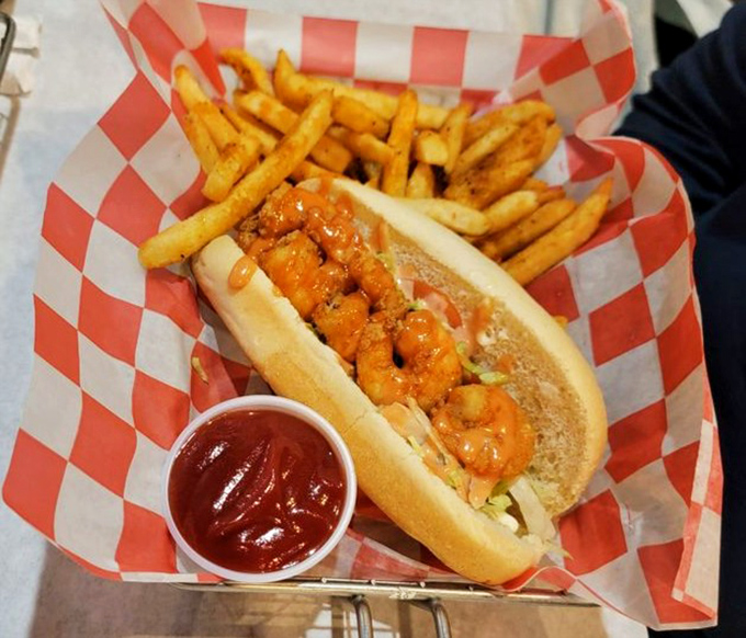 This shrimp po'boy isn't just a sandwich&mdash;it's a Southern handshake. Those golden fries are the perfect supporting cast.