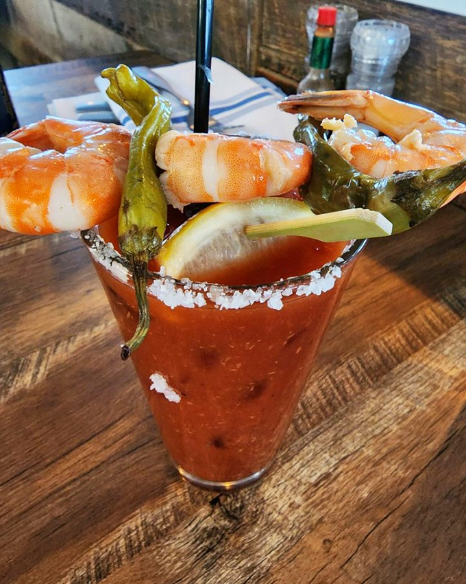 The Shrimply Mary &ndash; where cocktail meets appetizer in glorious harmony. Those roasted peppers and jumbo shrimp make this drink a meal in itself.