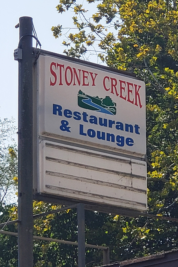 The sign that locals look for and out-of-towners eventually learn to treasure. Simple, straightforward, and promising good things ahead.