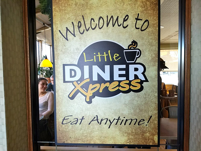 "Eat Anytime!" isn't just a slogan—it's a philosophy. Little Diner Xpress's welcoming sign promises judgment-free breakfast, whether it's 7 AM or dinner time.
