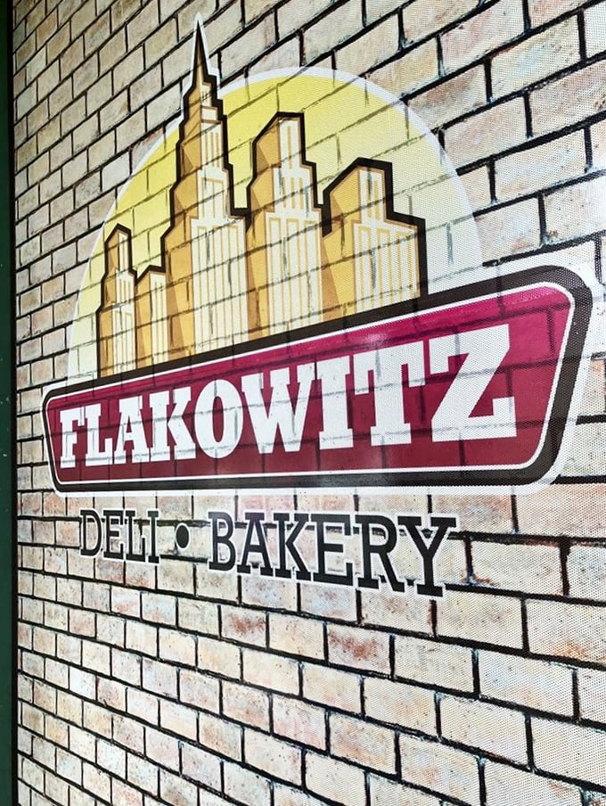 The Flakowitz logo pays homage to its New York roots. That skyline silhouette is like a bat signal for hungry people seeking authentic deli fare.