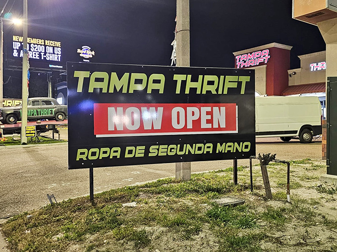 After dark, the Tampa Thrift sign glows with promise &ndash; announcing bargains in both English and Spanish to late-night treasure hunters.