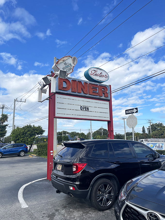 The sign that's guided hungry travelers for decades—like a neon North Star for those seeking comfort food in the Florida sunshine.