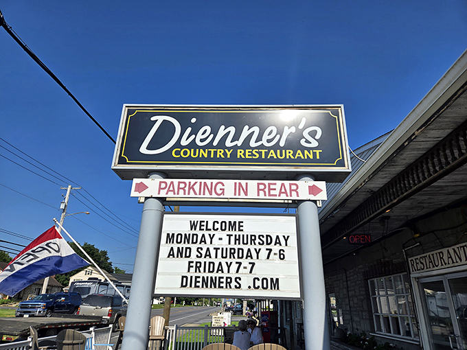 The sign stands tall against the Pennsylvania sky, a beacon for hungry travelers and locals alike. "Parking in rear" might be the three sweetest words in English.
