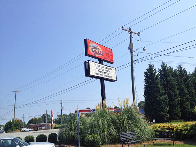 The roadside sign stands like a lighthouse, guiding hungry travelers to a port of culinary satisfaction in landlocked Walkertown.