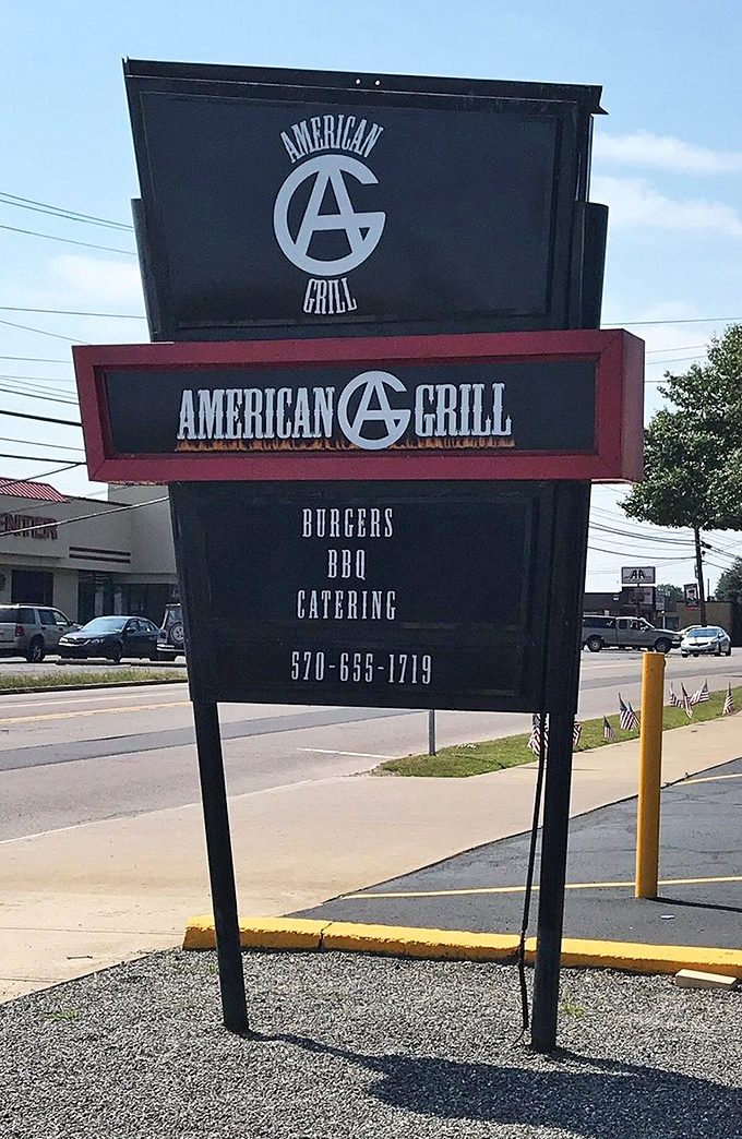 Simple signage announces big flavors, proving that the best barbecue joints never need flashy advertising to draw crowds.