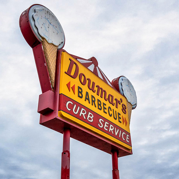Their sign stands against the sky like a mid-century masterpiece, complete with ice cream cone beacons. It doesn't just advertise&mdash;it announces an institution.