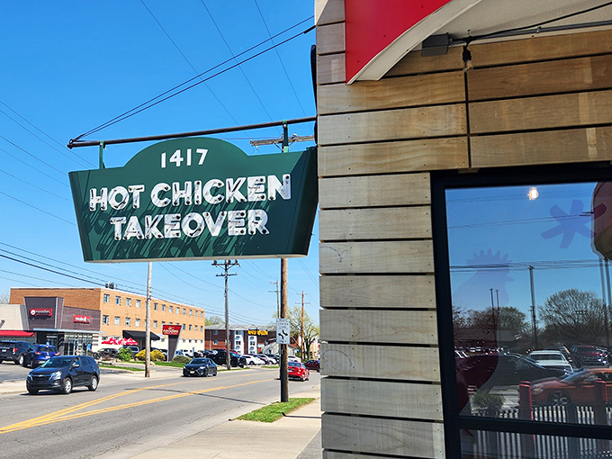 The sign doesn't whisper, it announces: Hot Chicken Takeover isn't just a name, it's a mission statement for Columbus' taste buds.