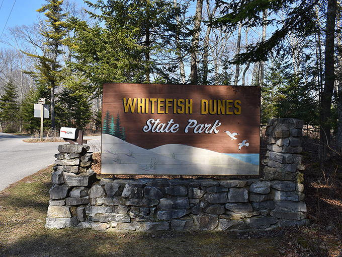 The entrance sign promises adventure while simultaneously warning you not to do anything stupid—the perfect Wisconsin welcome.