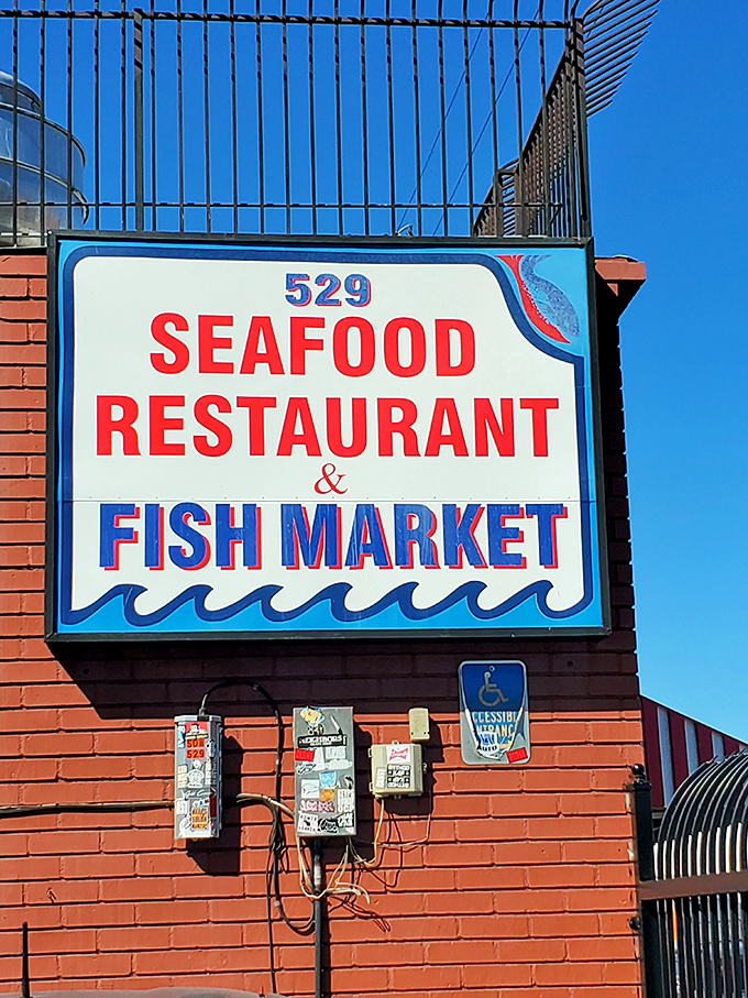 No fancy signage needed when your reputation is built on decades of seafood excellence. Sometimes the most straightforward signs lead to the best meals.
