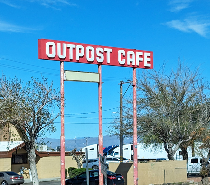 That classic roadside sign promising good food ahead &ndash; sometimes the best adventures start with simple promises.