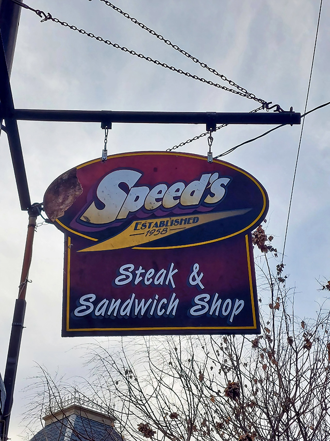 The sign promises steak and sandwich salvation since 1958. Some traditions are worth preserving for eternity.