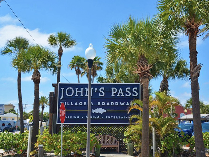 Palm trees stand guard over the iconic blue sign. They've been welcoming visitors since before Instagram made everything a photo op.
