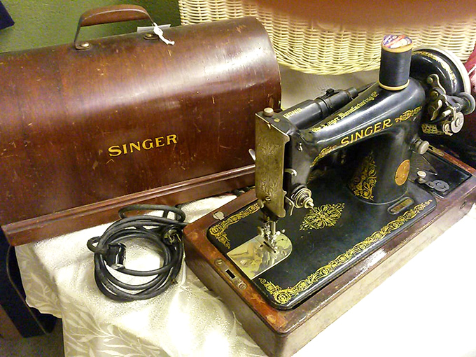 This Singer sewing machine stitched together families' wardrobes long before fast fashion. The wooden case alone is a masterpiece.