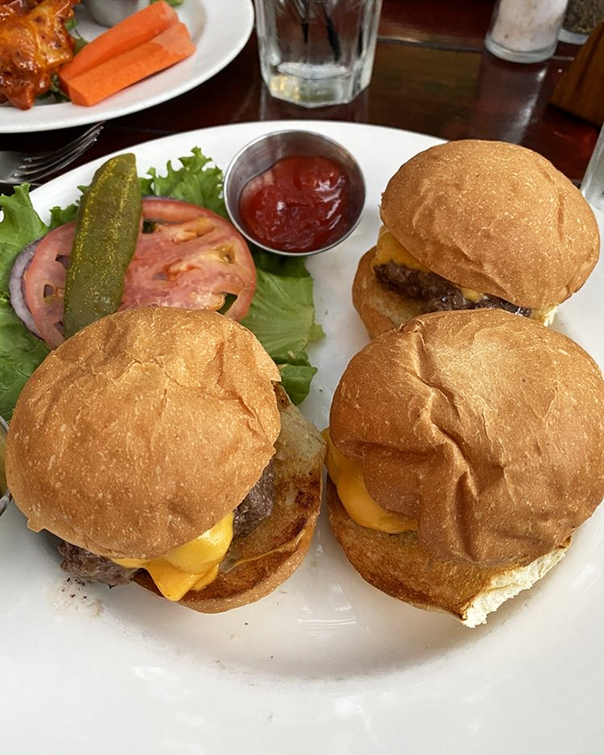 These sliders aren't just mini burgers &ndash; they're perfectly proportioned flavor bombs on pillowy buns that disappear far too quickly.