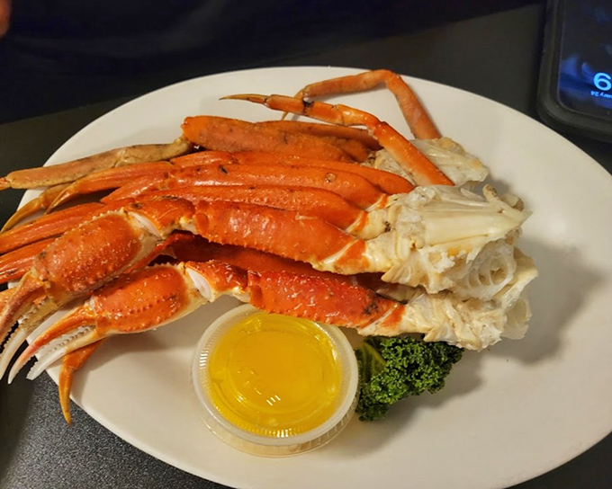 Snow crab legs arranged with the kind of care that says, "Yes, we understand this is basically a religious experience for seafood lovers."