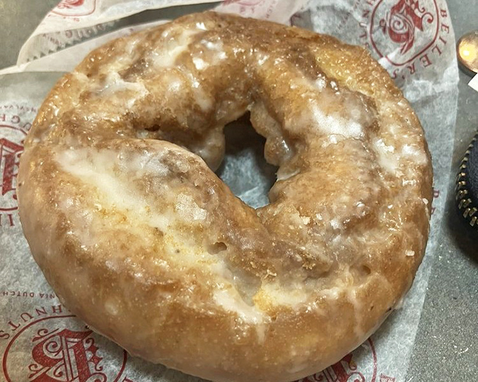 The humble sour cream donut &ndash; unassuming in appearance but extraordinary in texture. That perfect glaze crackle is music to a donut lover's ears.