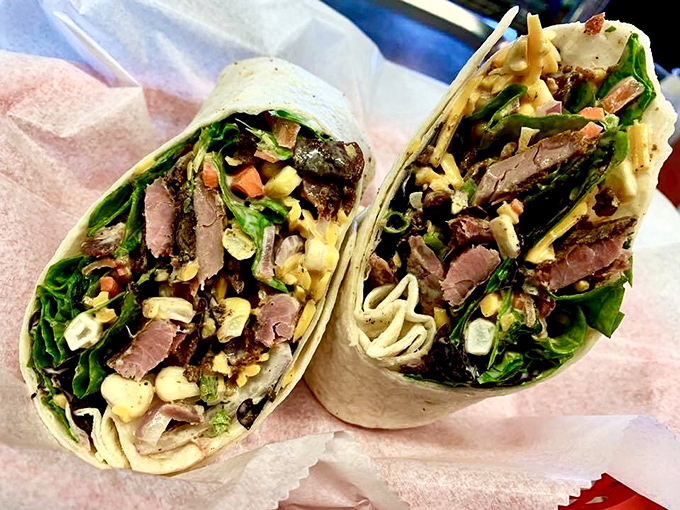 The wrap that solved the "too many good things to choose from" dilemma by combining smoked meat, fresh veggies, and zesty sauce in one handheld package.