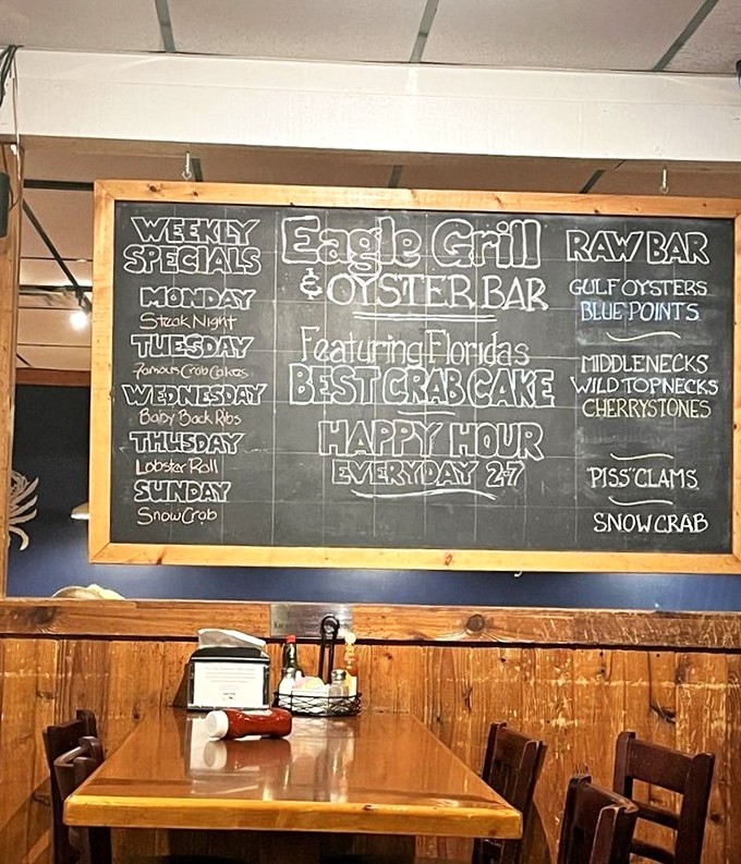 The specials board—a daily love letter to seafood enthusiasts and proof that the best restaurants still use chalk.