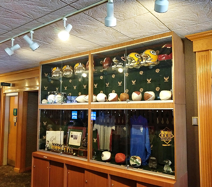 Not just decoration—this shrine to Packers history tells the story of a community's passion, one helmet and signed ball at a time.