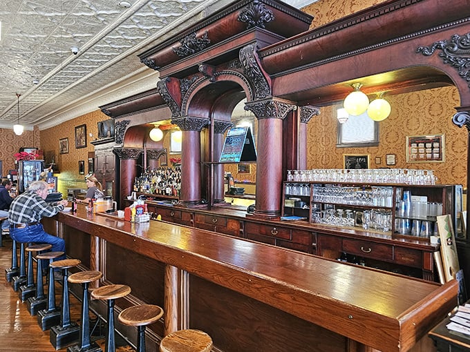 The magnificent back bar with its polished wood and classic details&mdash;a reminder of when craftsmanship mattered and bars were the heart of community.