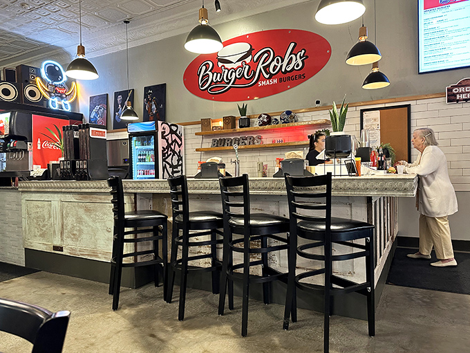 Where burger dreams come true: the counter staff ready to transform simple ingredients into handheld masterpieces.