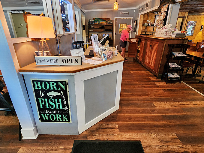 The "Born to Fish, Forced to Work" sign at the host stand perfectly captures the spirit of a place where seafood isn't just food&mdash;it's a calling.