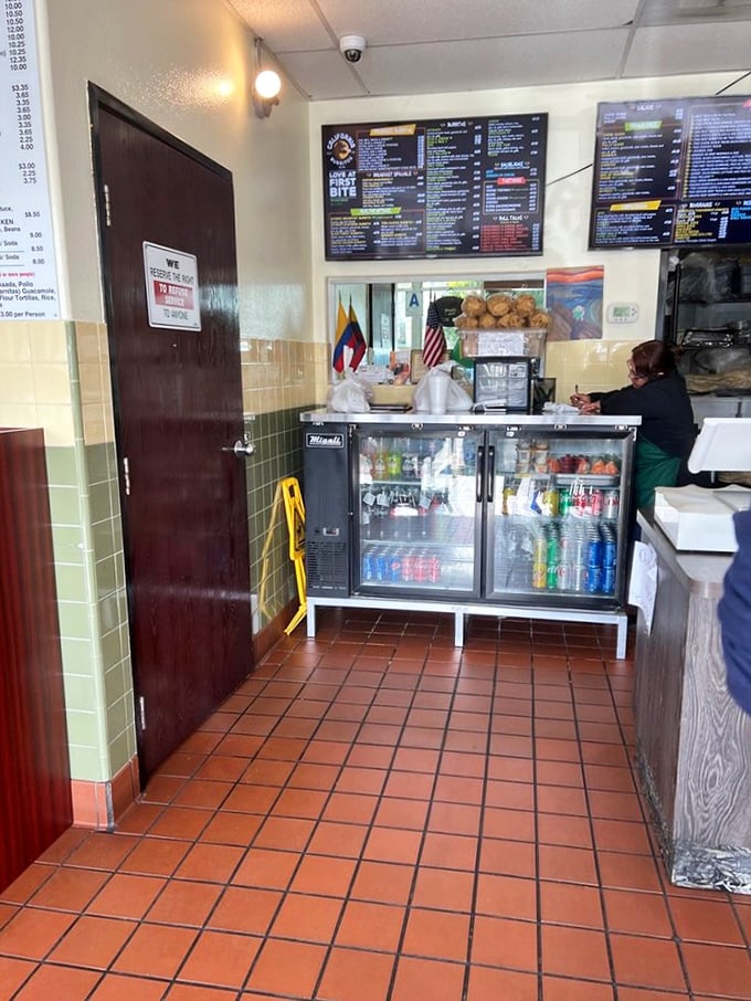 Behind the scenes where the magic happens. The staff moves with the practiced efficiency of people who have made thousands of perfect burritos.